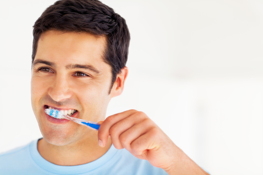 Young Man Brushing Teeth - Alamo Springs Dental Blog